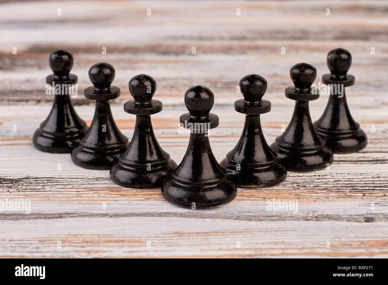 Composition of black chess pawns Stock Photo - Alamy
