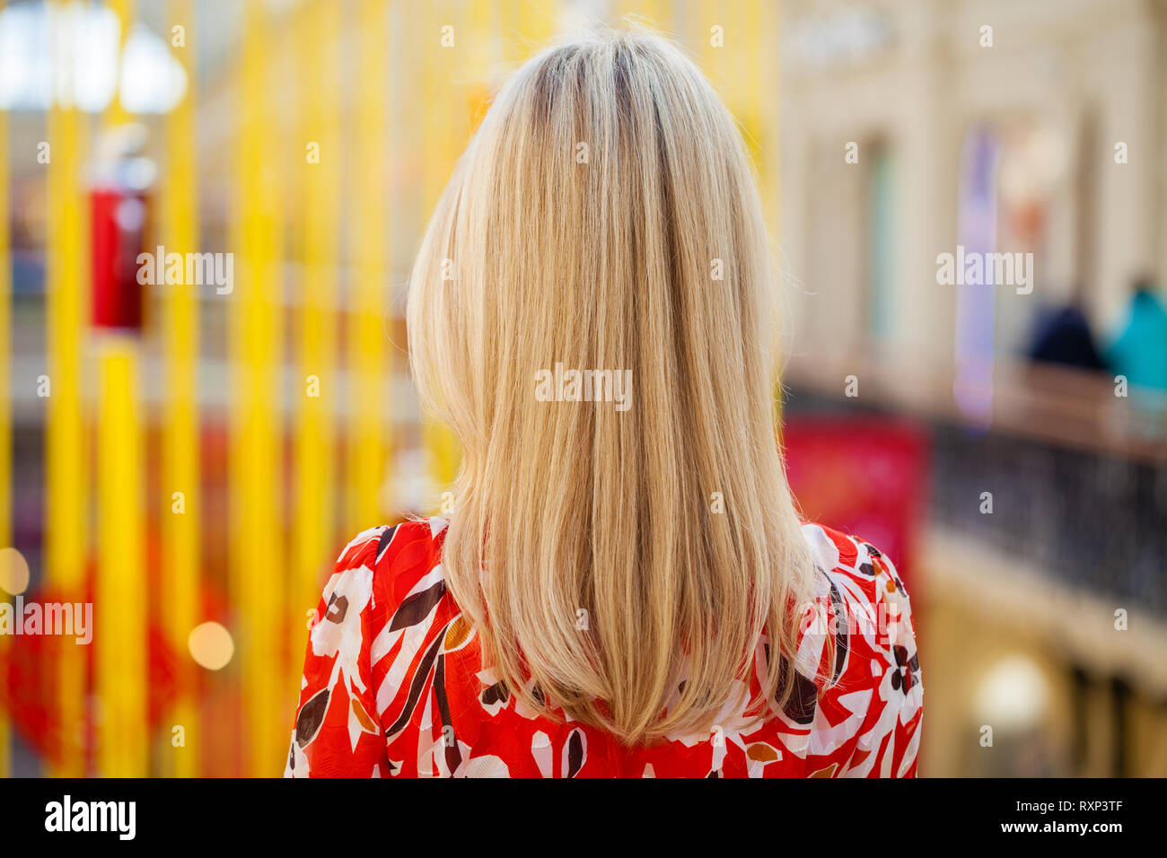 Female Long blonde hair, rear view, indoor beauty salon Stock Photo - Alamy