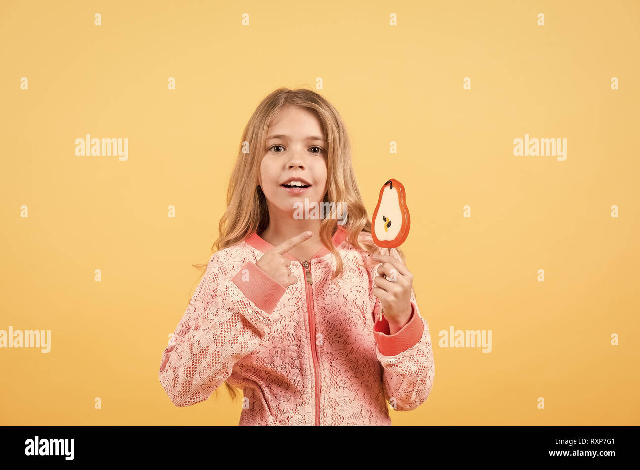 Child point finger at candy on stick, food. Child girl with lollipop ...