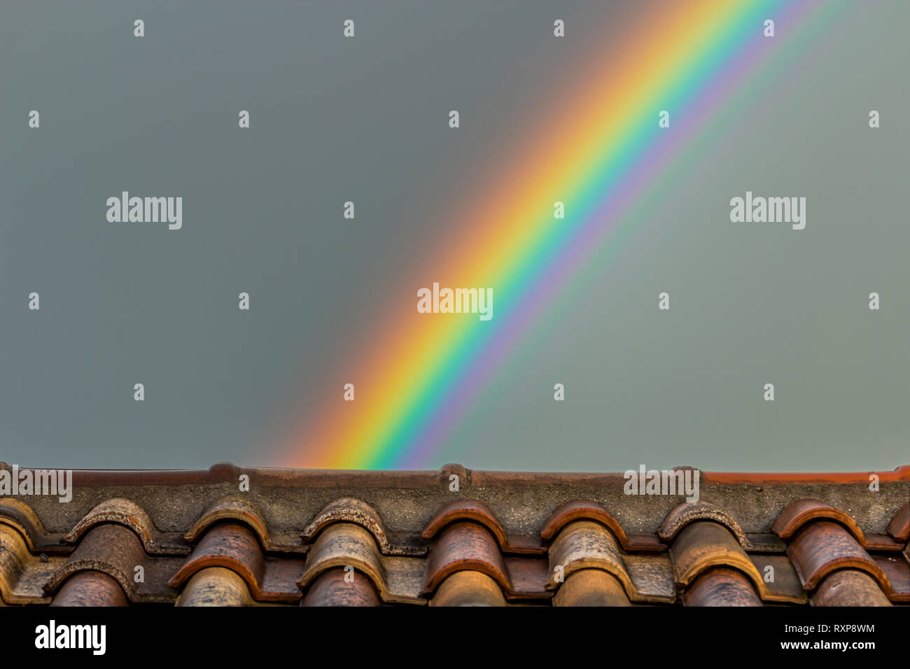 Rainbow on the roof Stock Photo - Alamy