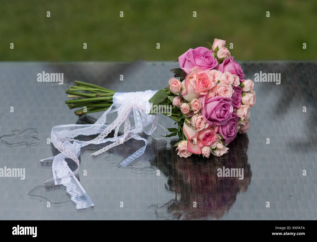 Bunch of rose flowers on table on natural background Stock Photo - Alamy