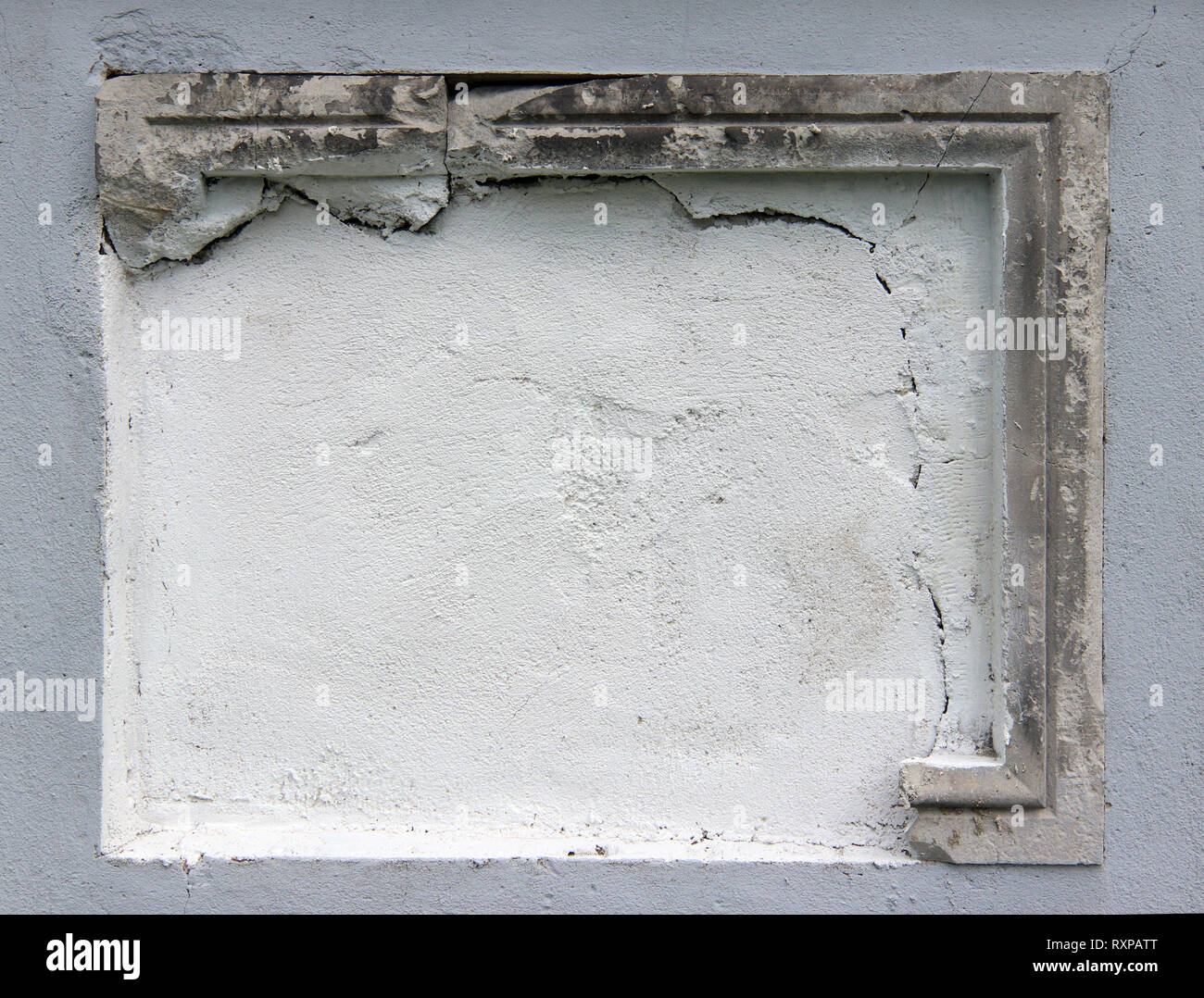 Blank stone frame on a wall Stock Photo - Alamy