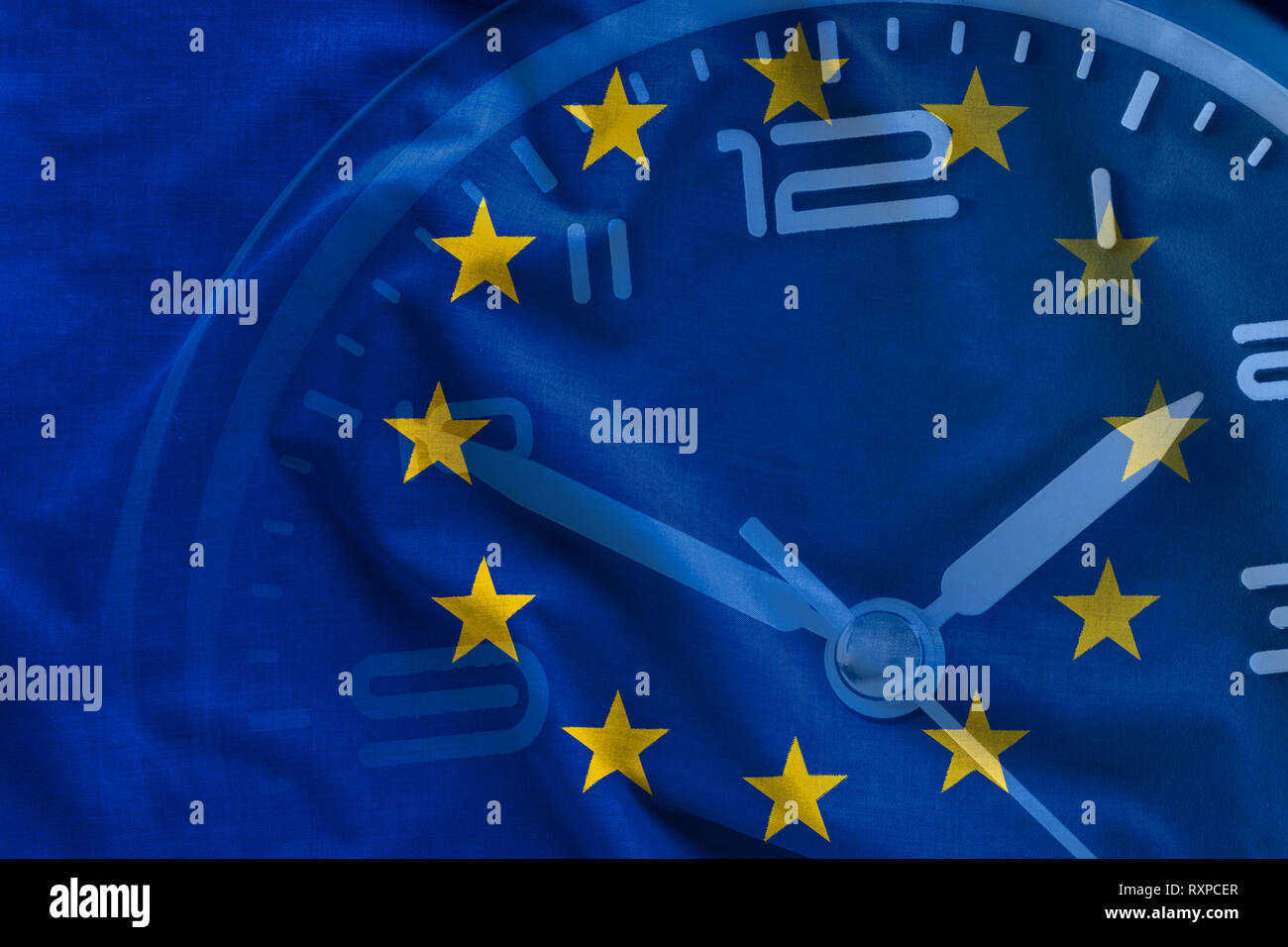 Overlay of the EU flag and the dial of a clock with hands and numerals ...