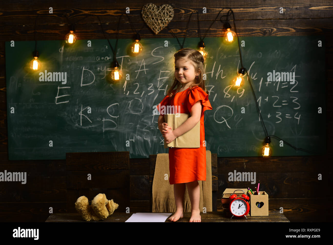 Child needs to stay focused to finish her work.Pupil is having one-on ...