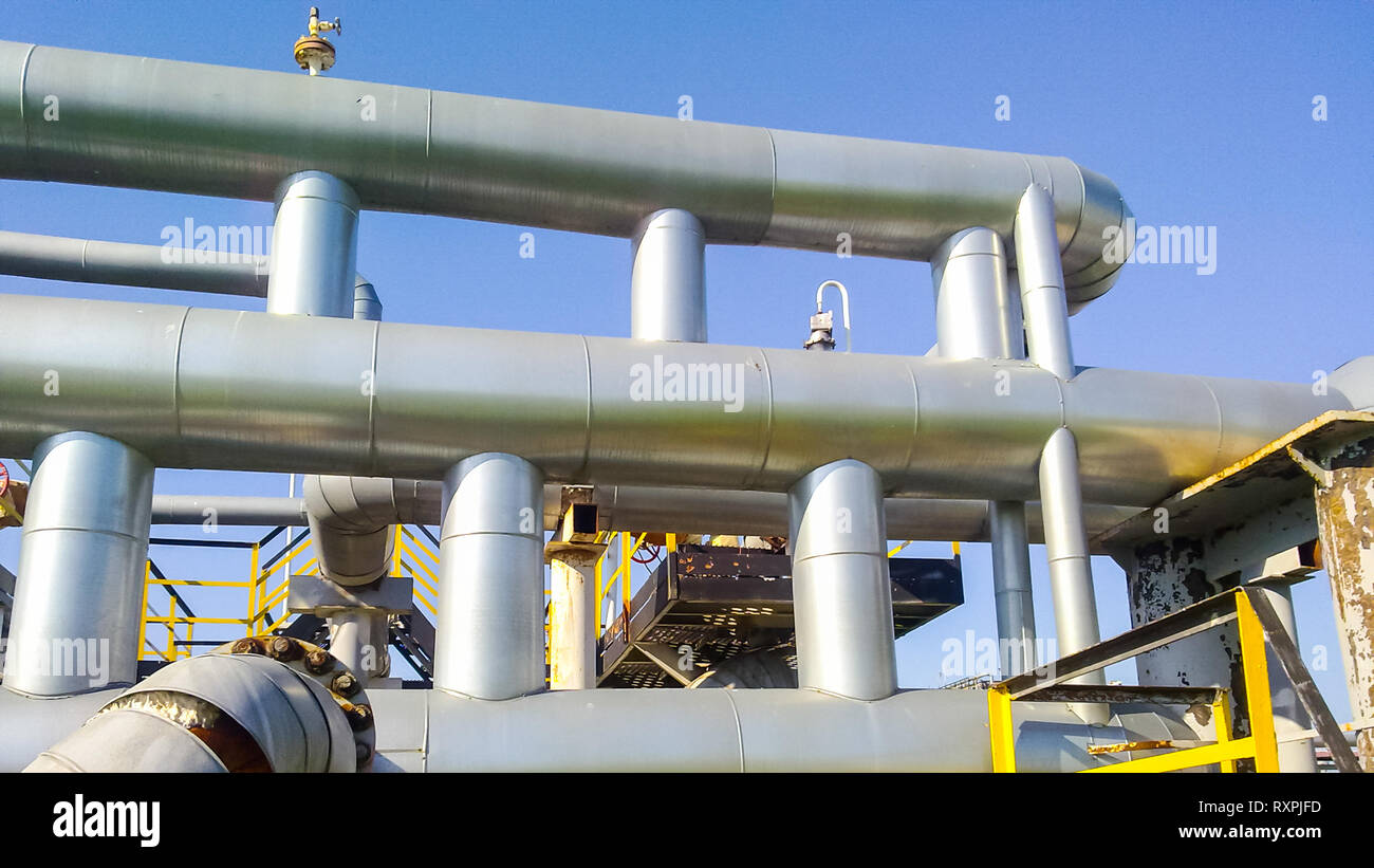 Oil field. The equipment of crafts , iron designs and pipes Stock Photo ...