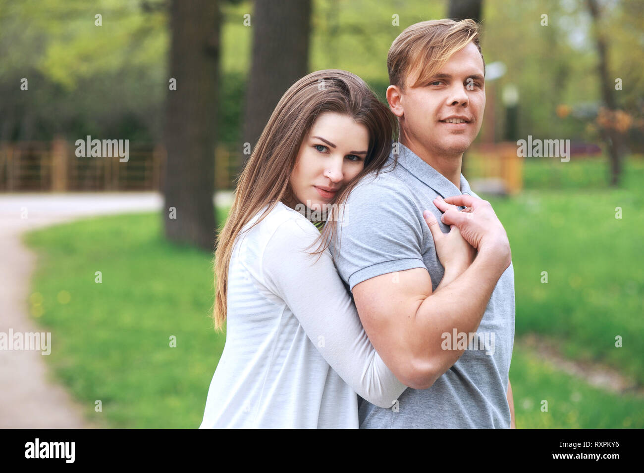 Happy couple expecting pregnancy portrait outdoor Stock Photo - Alamy