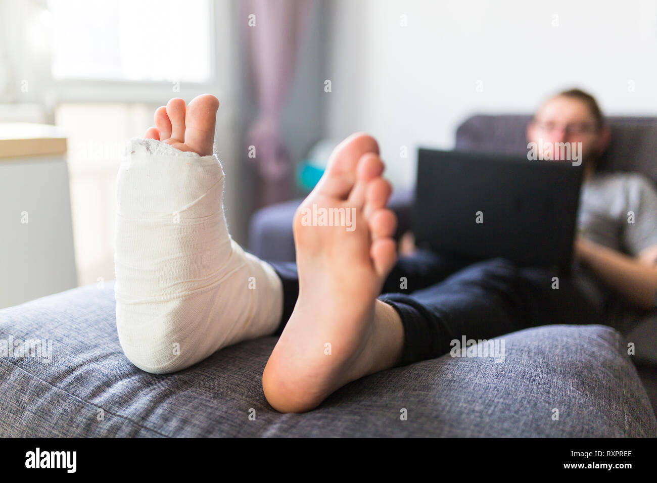 Home convalescence after breaking the right leg Stock Photo - Alamy