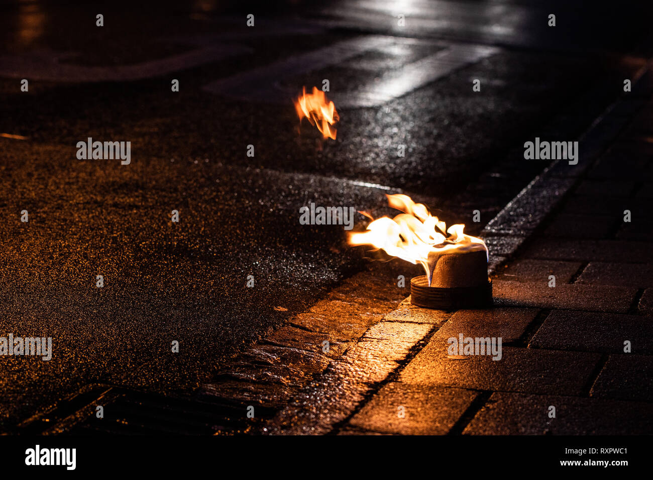 small fire on street Stock Photo - Alamy