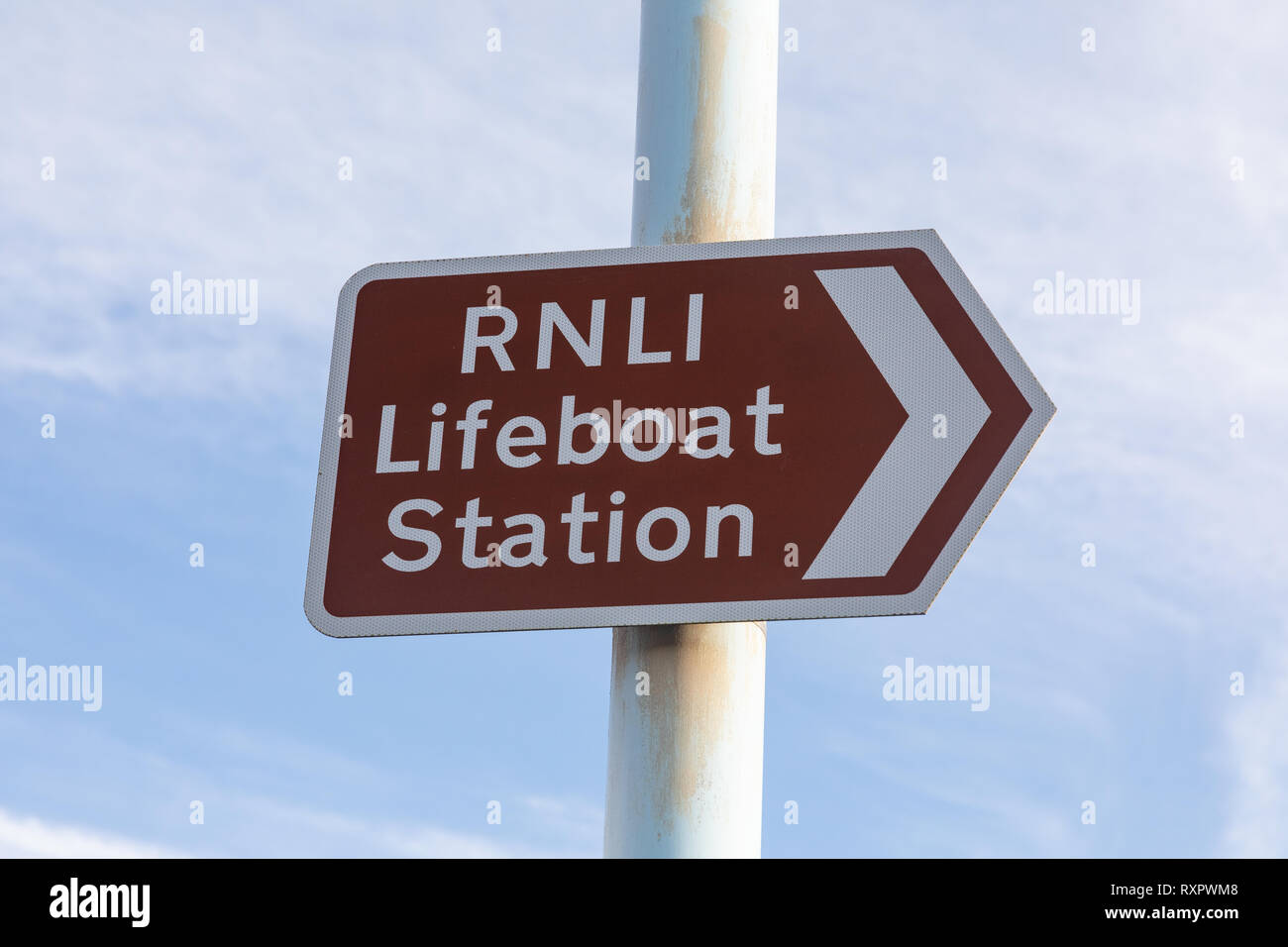 Brown tourist sign indication direction to RNLI lifeboat station St ...