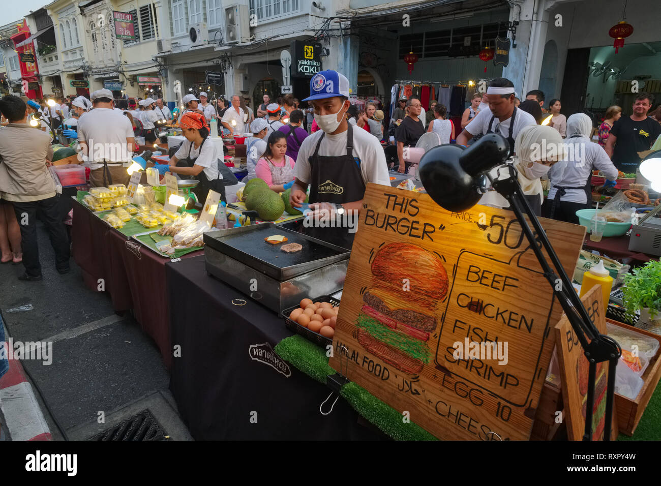 A stall offering burgers of various kinds in Walking Street Market, Old ...