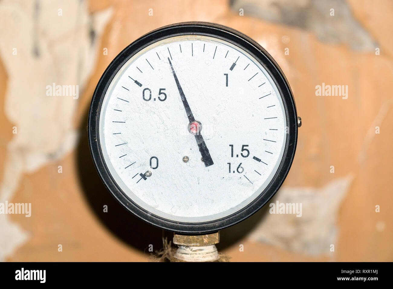 Pressure gauge on home heating system Stock Photo - Alamy