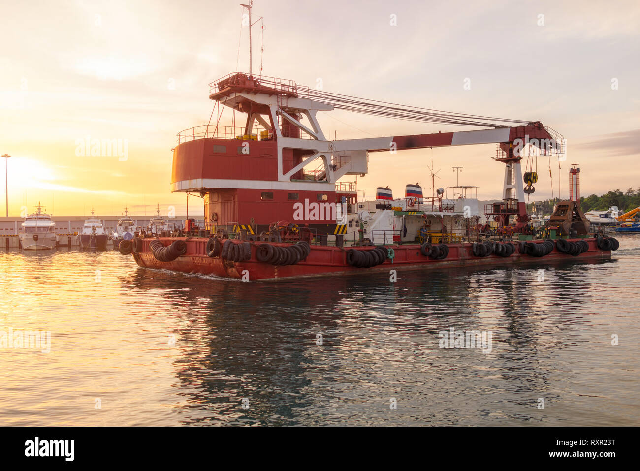 Large barge with a powerful 100 ton crane in the port Stock Photo - Alamy
