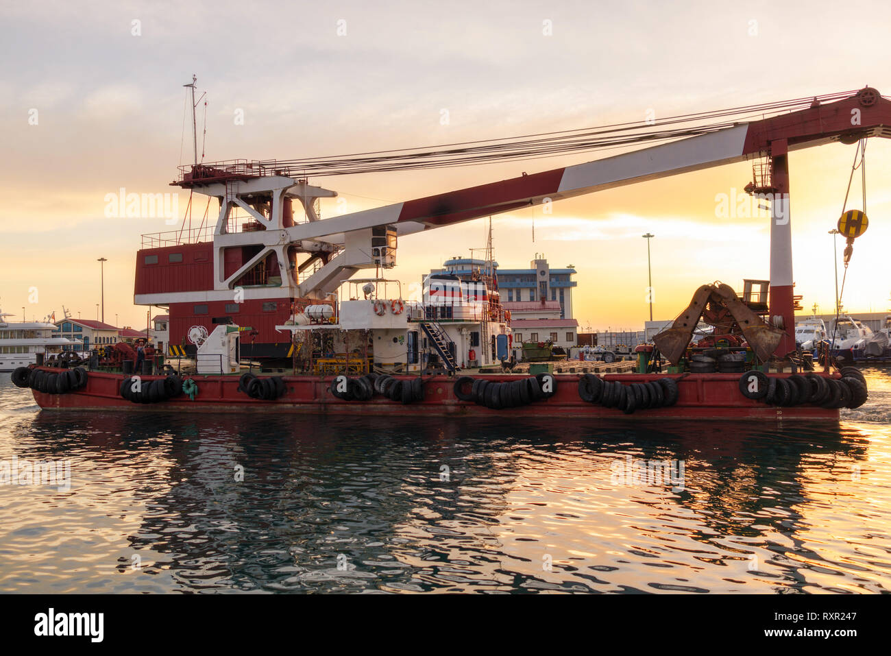 Large barge with a powerful 100 ton crane in the port Stock Photo - Alamy