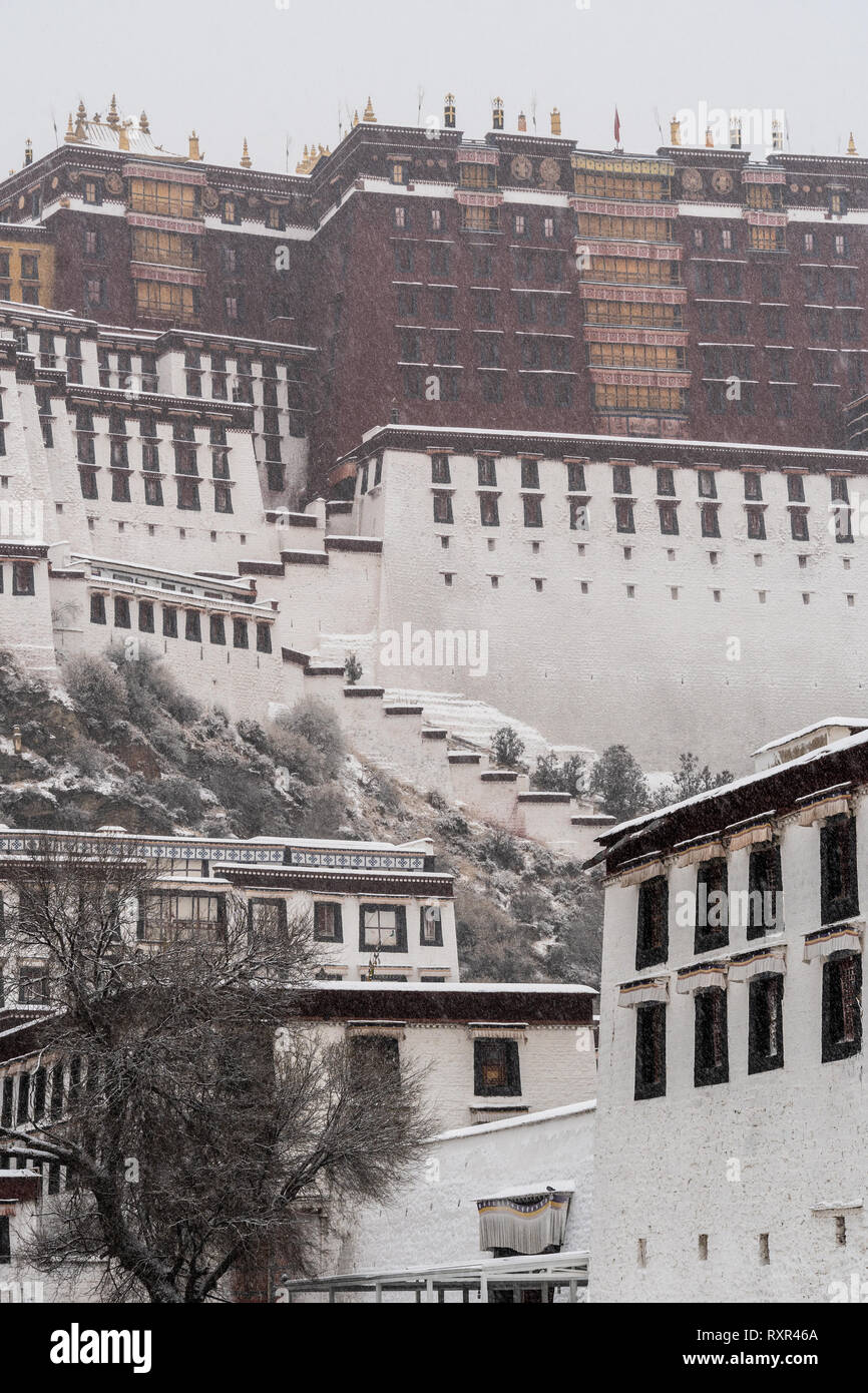 Snow falling on the famous Potala Palace in Lhasa in Tibet capital city ...