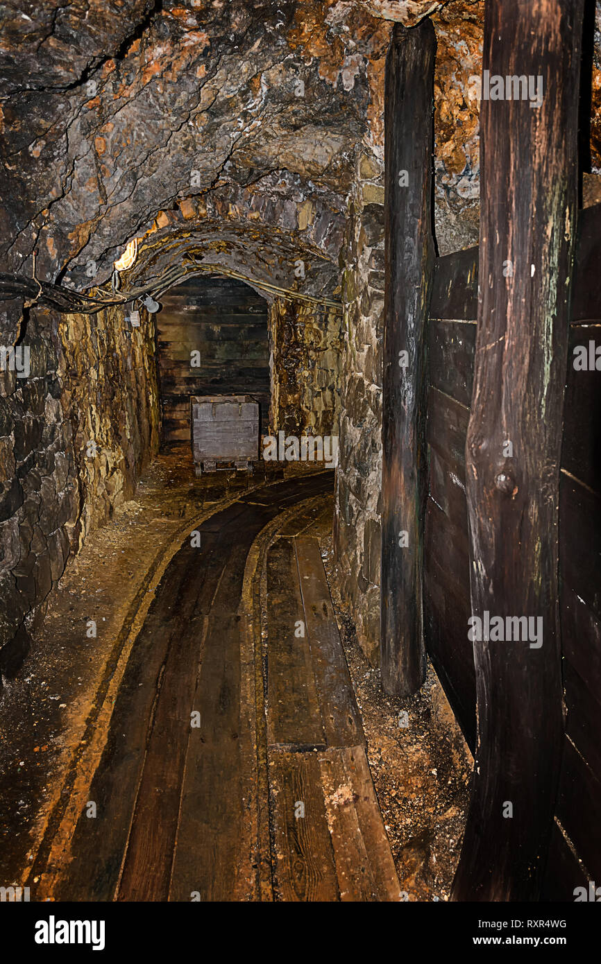 Old wooden mine chart in abandoned mine shaft with wooden timbering ...