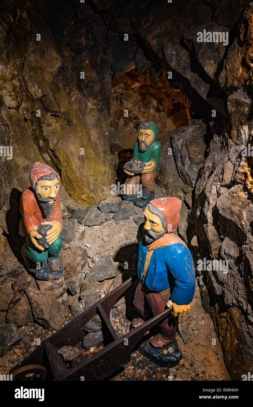 Wooden mine dwarfs with tools in mine shaft Stock Photo - Alamy
