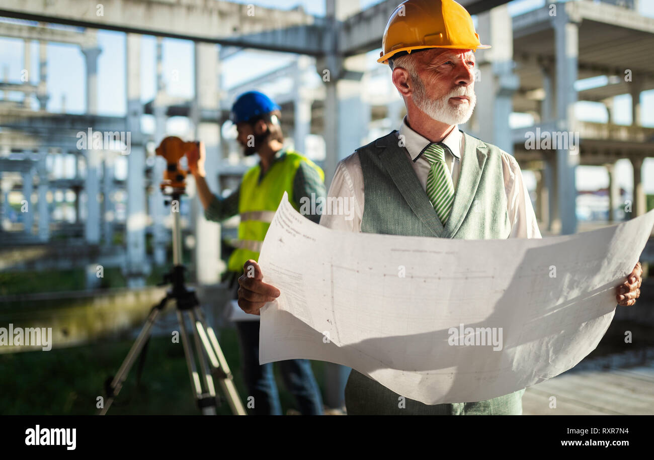 Group of construction engineer working in construction site Stock Photo ...
