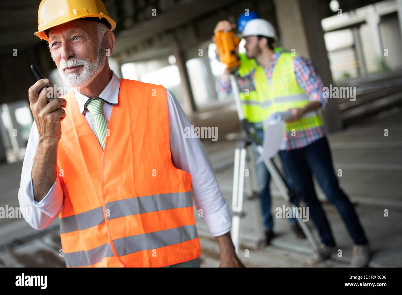 Group of construction engineer working in construction site Stock Photo ...