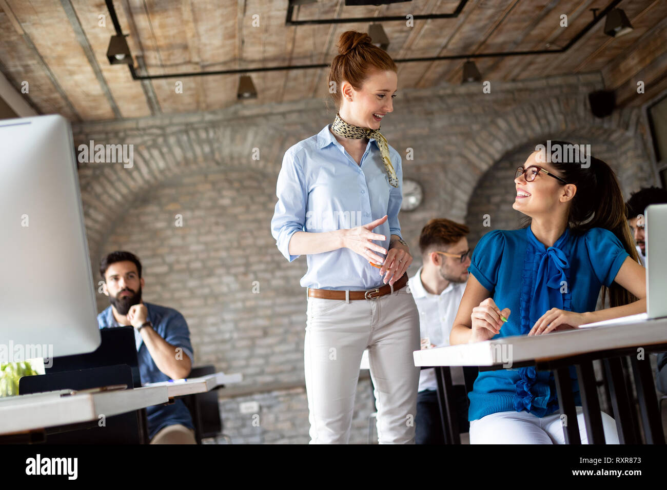 Successful happy group of people learning software engineering and ...