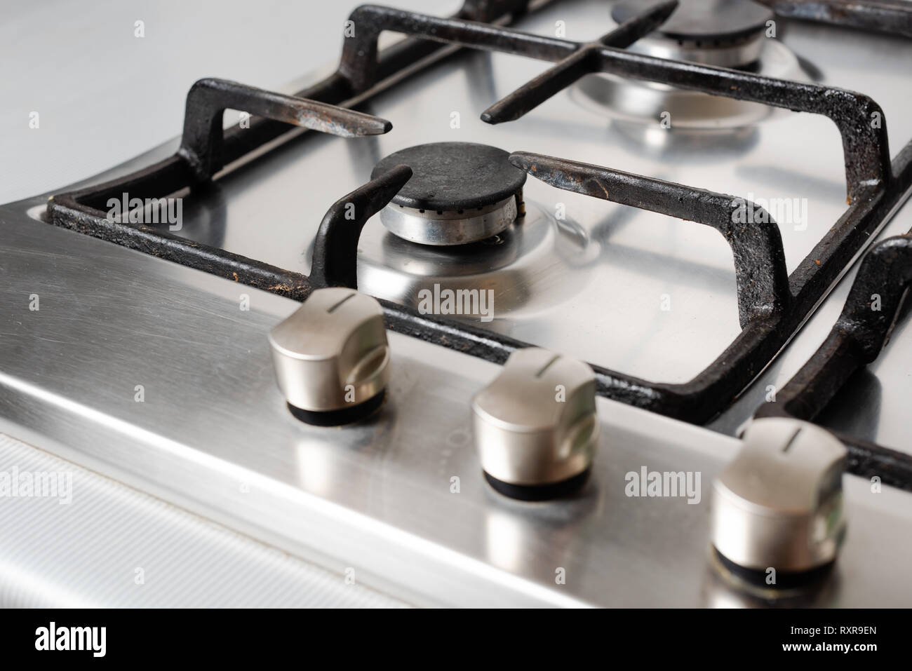 Clean and neat surface of gas stove Stock Photo - Alamy