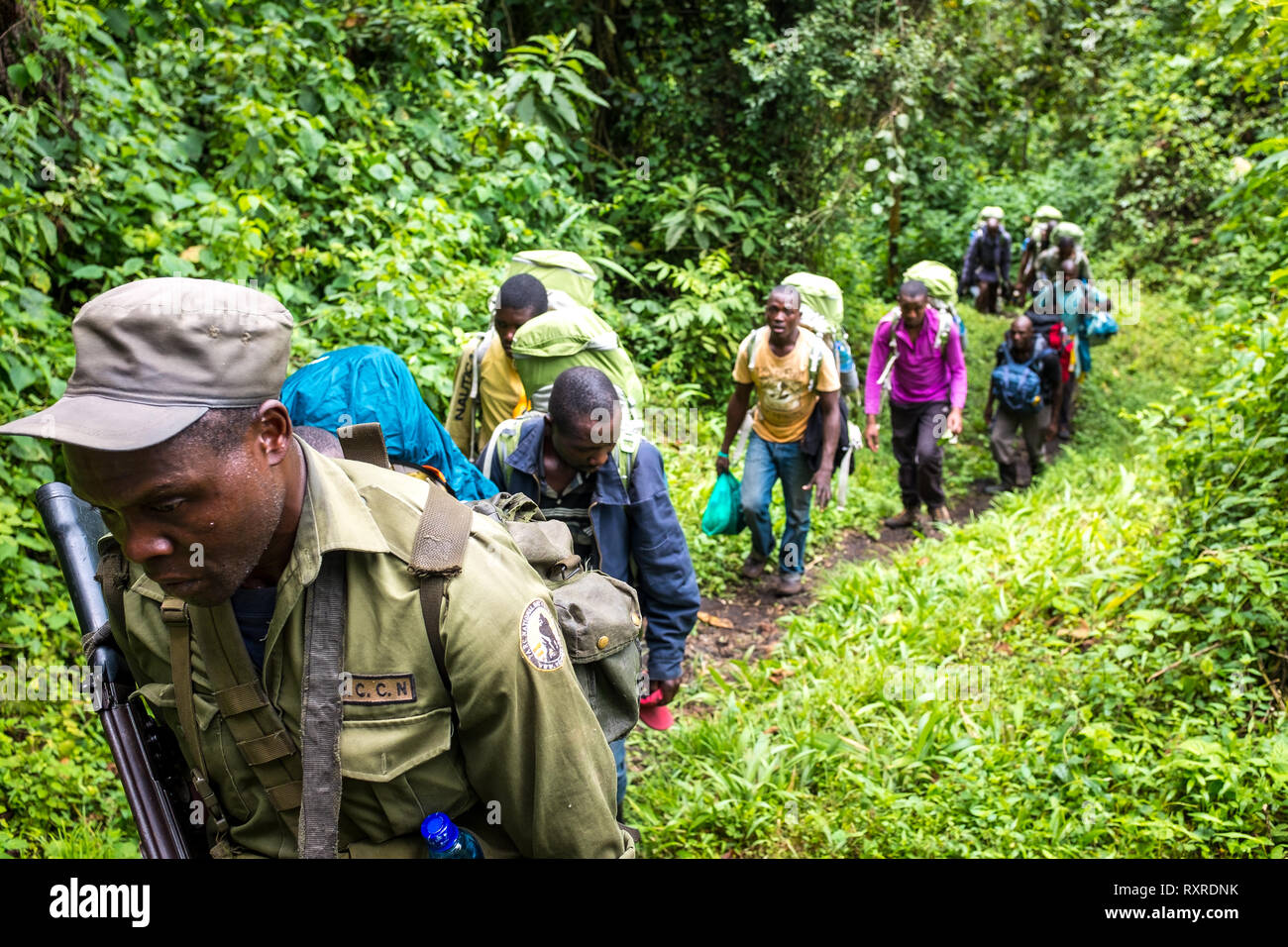 Hikers climbing Mount Nyiragongo volcano in the Democratic republic of ...