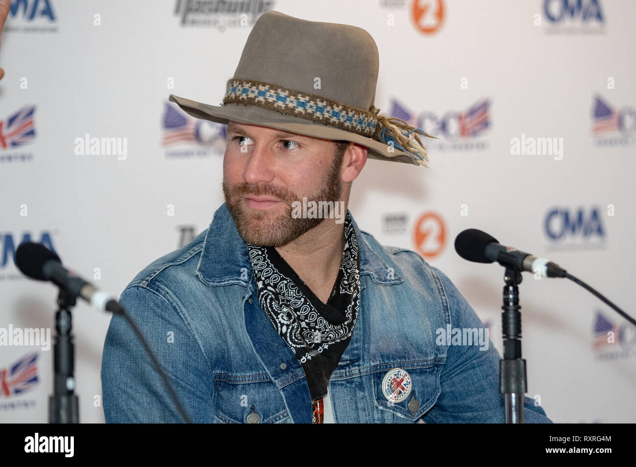 London, UK. 10th Mar 2019. Drake White poses backstage on day 3 of C2C ...