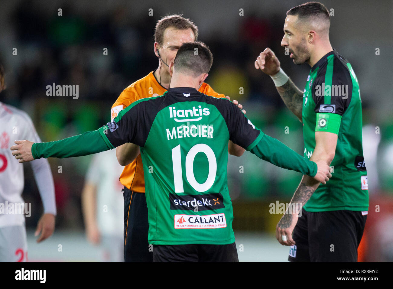 BRUGES, BELGIUM - March 10th : Referee Nathan Verboomen discussing with ...