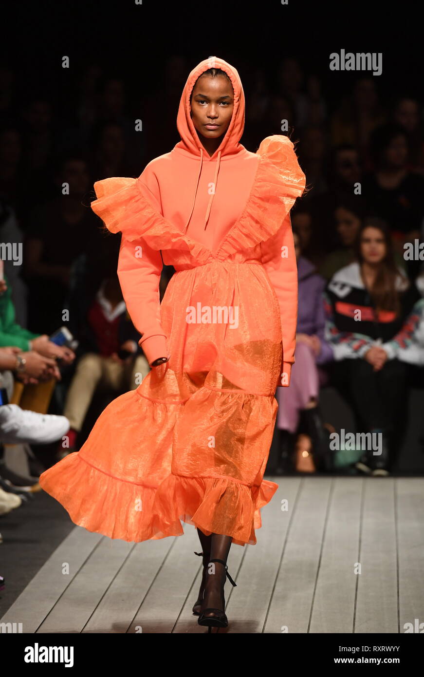Lisbon, Portugal. 10th Mar, 2019. A model presents a creation of ...