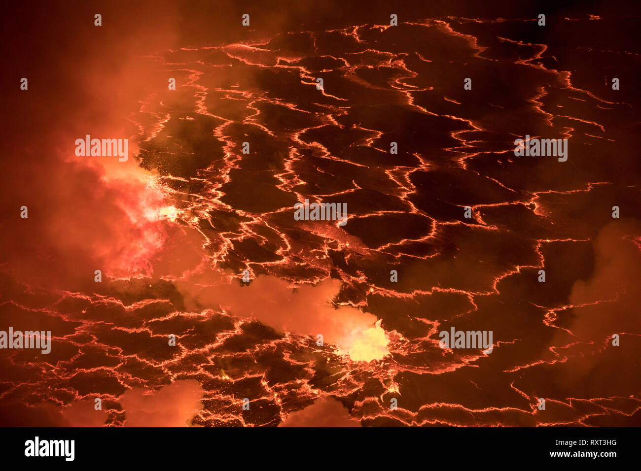The lava lake at the top of Nyiragongo Volcano in the DRC Stock Photo ...