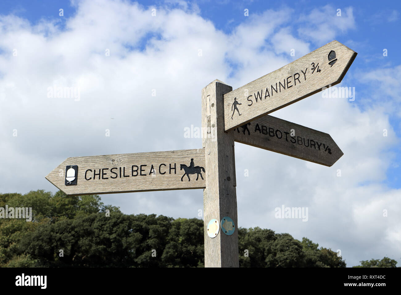 Wooden signpost at Abbotsbury Dorset England UK Stock Photo - Alamy