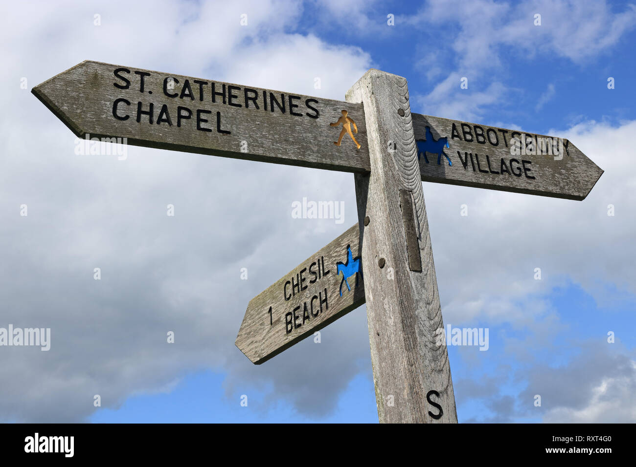 Wooden signpost to St Catherines Chapel, Chesil Beach and Abbotsbury ...