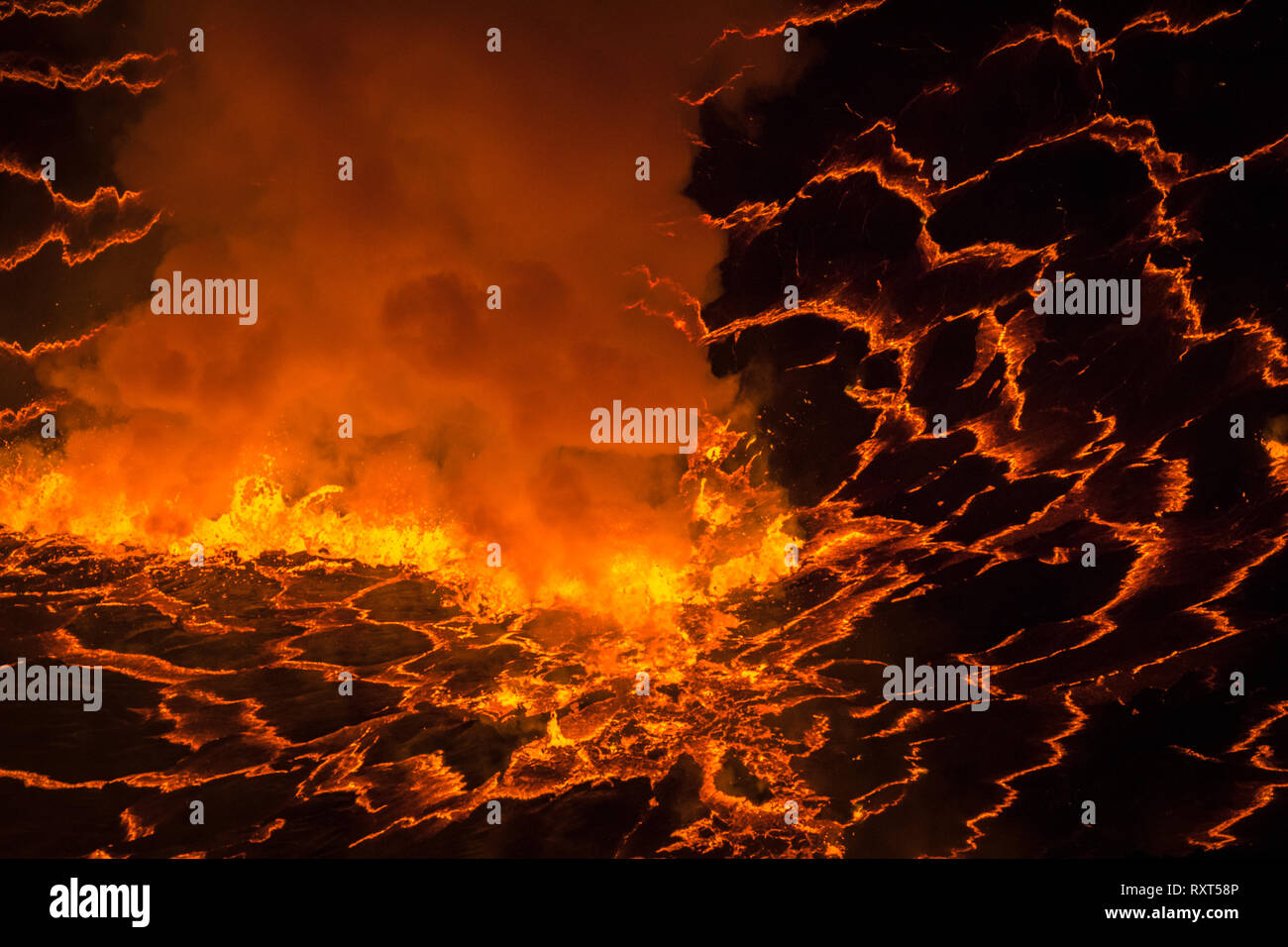 The lava lake at the top of Nyiragongo Volcano in the DRC Stock Photo ...