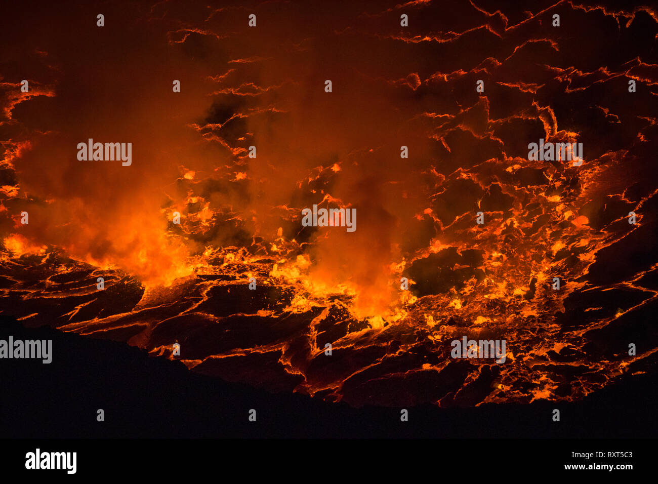 The lava lake at the top of Nyiragongo Volcano in the DRC Stock Photo ...