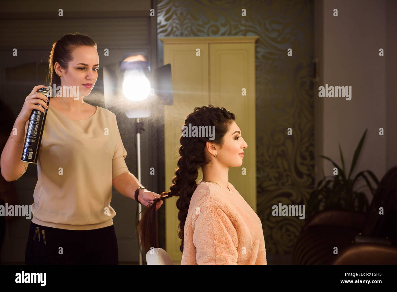 Beautiful Young Woman With Braid Hairstyle. Beautiful woman getting ...