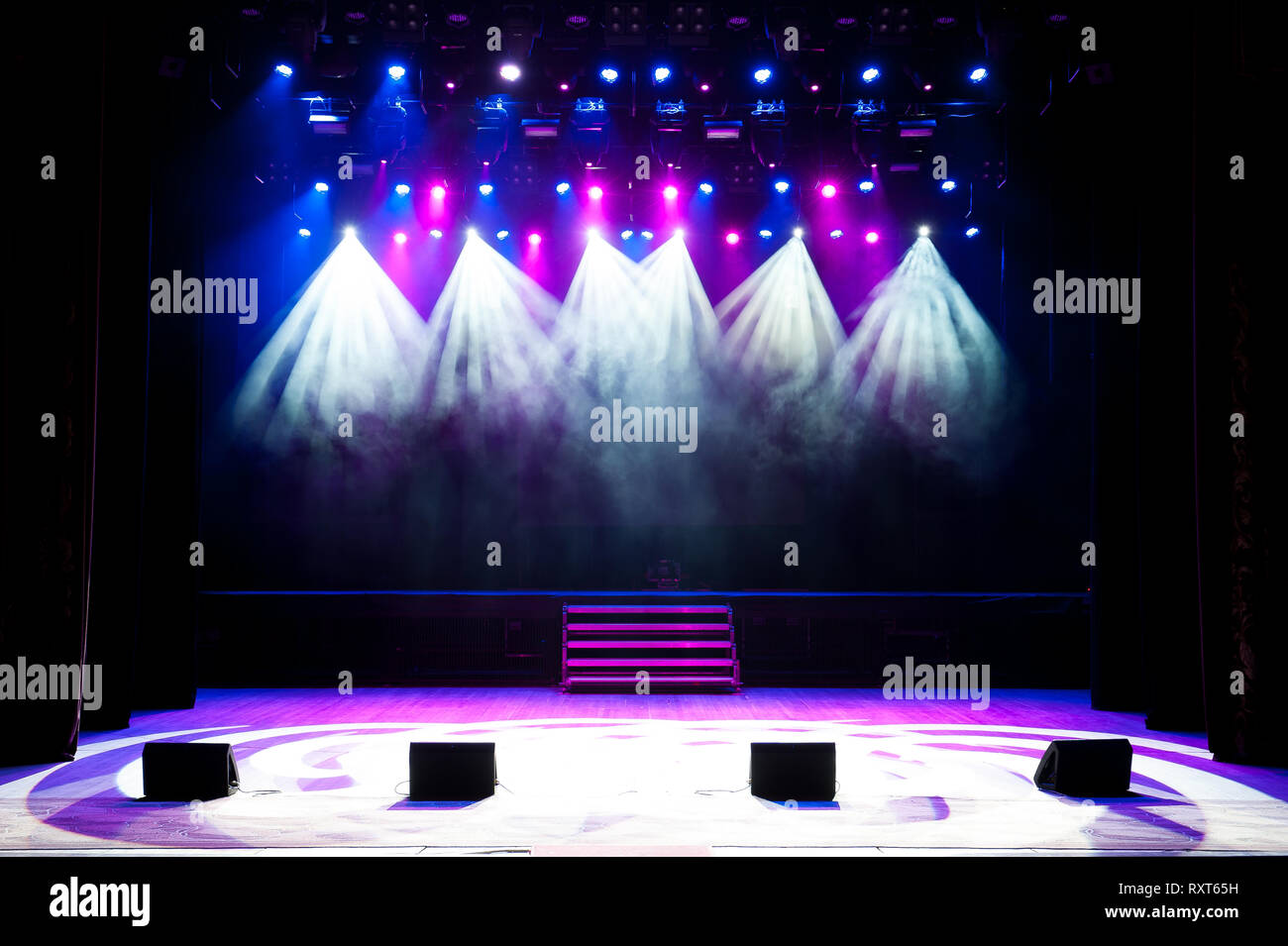 Free stage with lights, lighting devices. Night show Stock Photo - Alamy