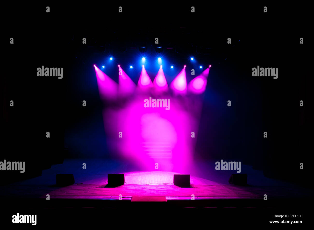 Free stage with lights, lighting devices. Night show Stock Photo - Alamy