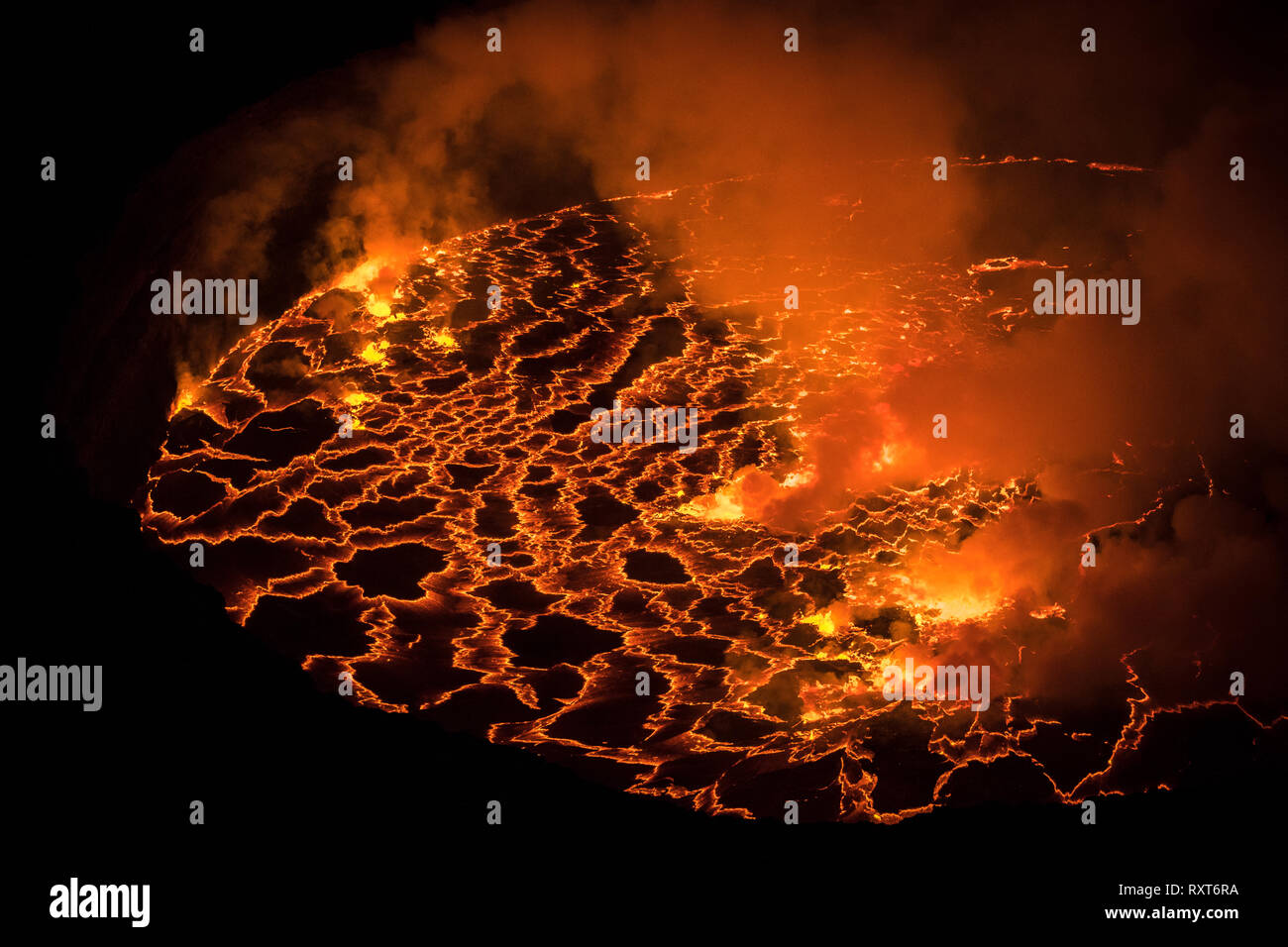The lava lake at the top of Nyiragongo Volcano in the DRC Stock Photo ...