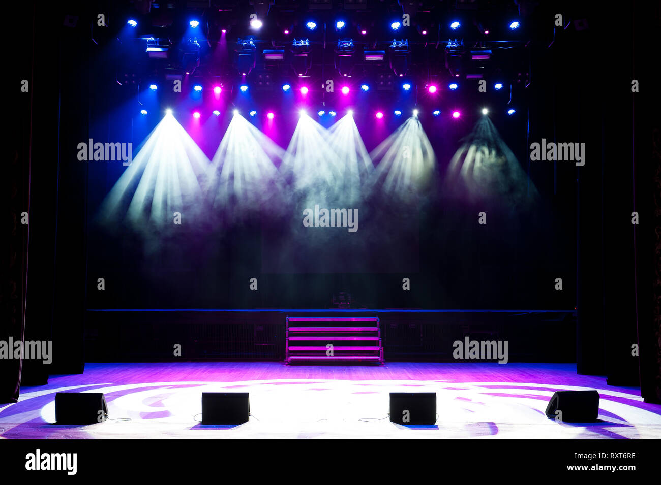 Free stage with lights, lighting devices. Night show Stock Photo - Alamy
