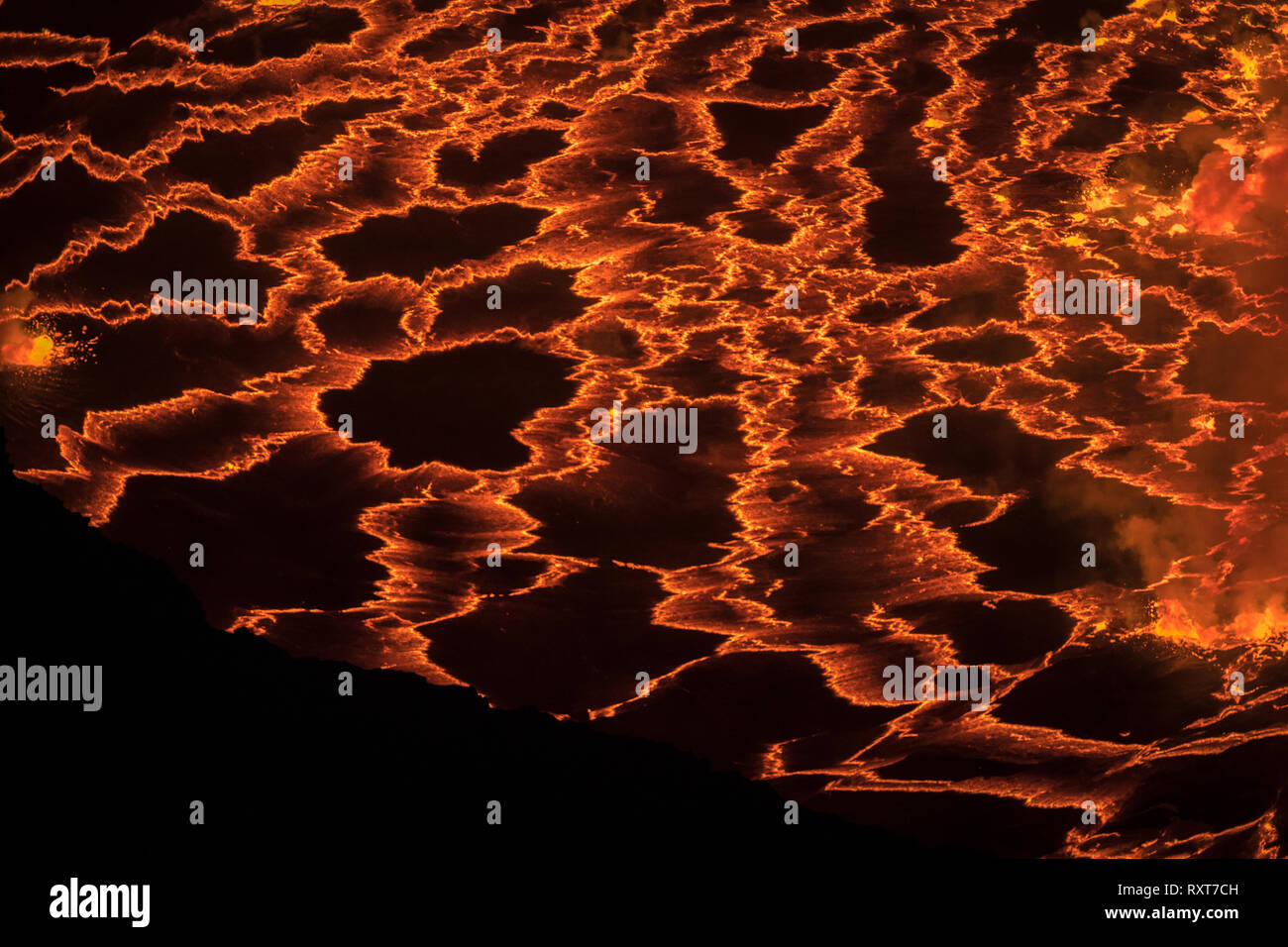 The lava lake at the top of Nyiragongo Volcano in the DRC Stock Photo ...