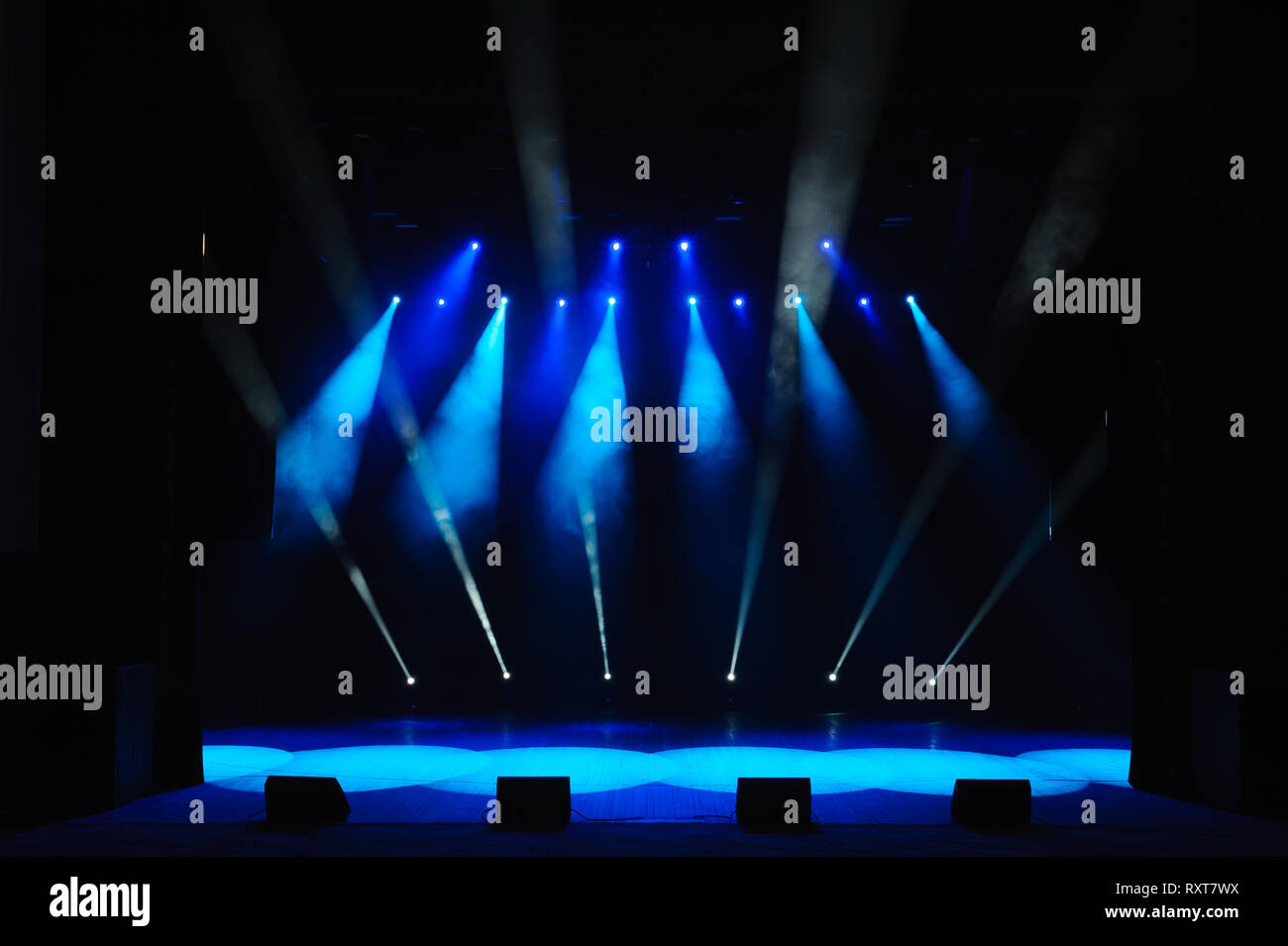 Free stage with lights, lighting devices. Night show Stock Photo - Alamy