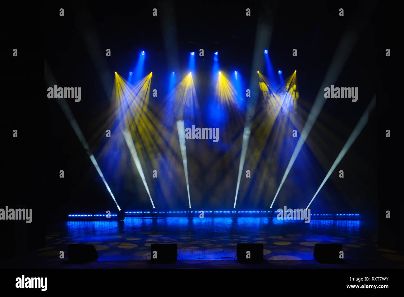 Free stage with lights, lighting devices. Night show Stock Photo - Alamy