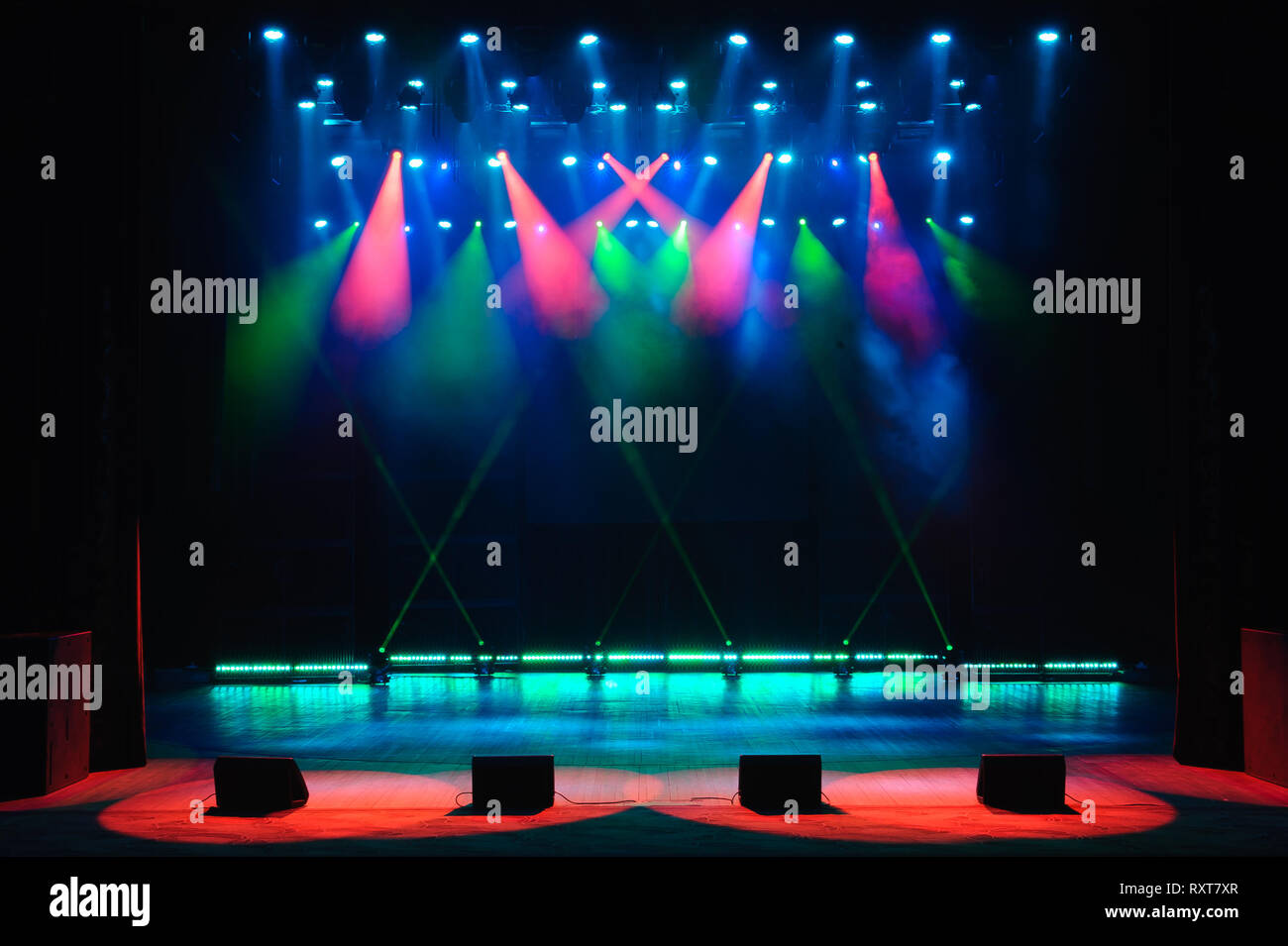 Free stage with lights, lighting devices. Night show Stock Photo - Alamy