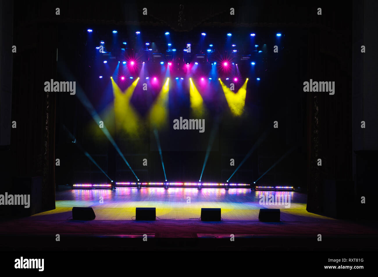 Free stage with lights, lighting devices. Night show Stock Photo - Alamy