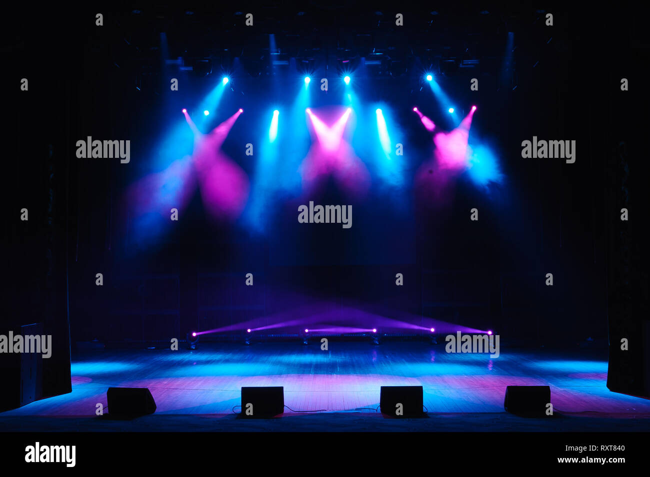 Free stage with lights, lighting devices. Night show Stock Photo - Alamy