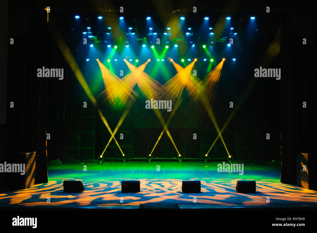 Free stage with lights, lighting devices. Night show Stock Photo - Alamy