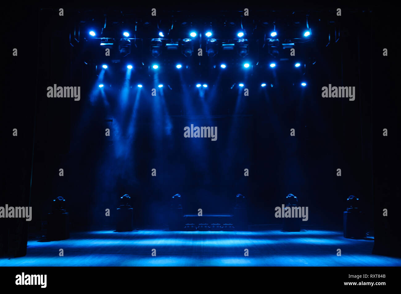 Free stage with lights, lighting devices. Night show Stock Photo - Alamy