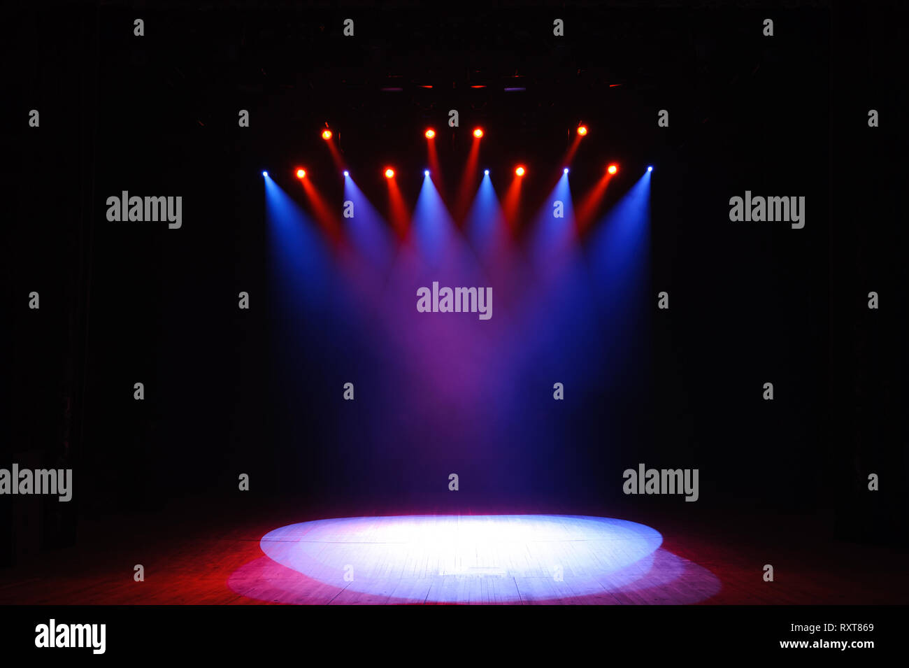 Free stage with lights, lighting devices. Night show Stock Photo - Alamy