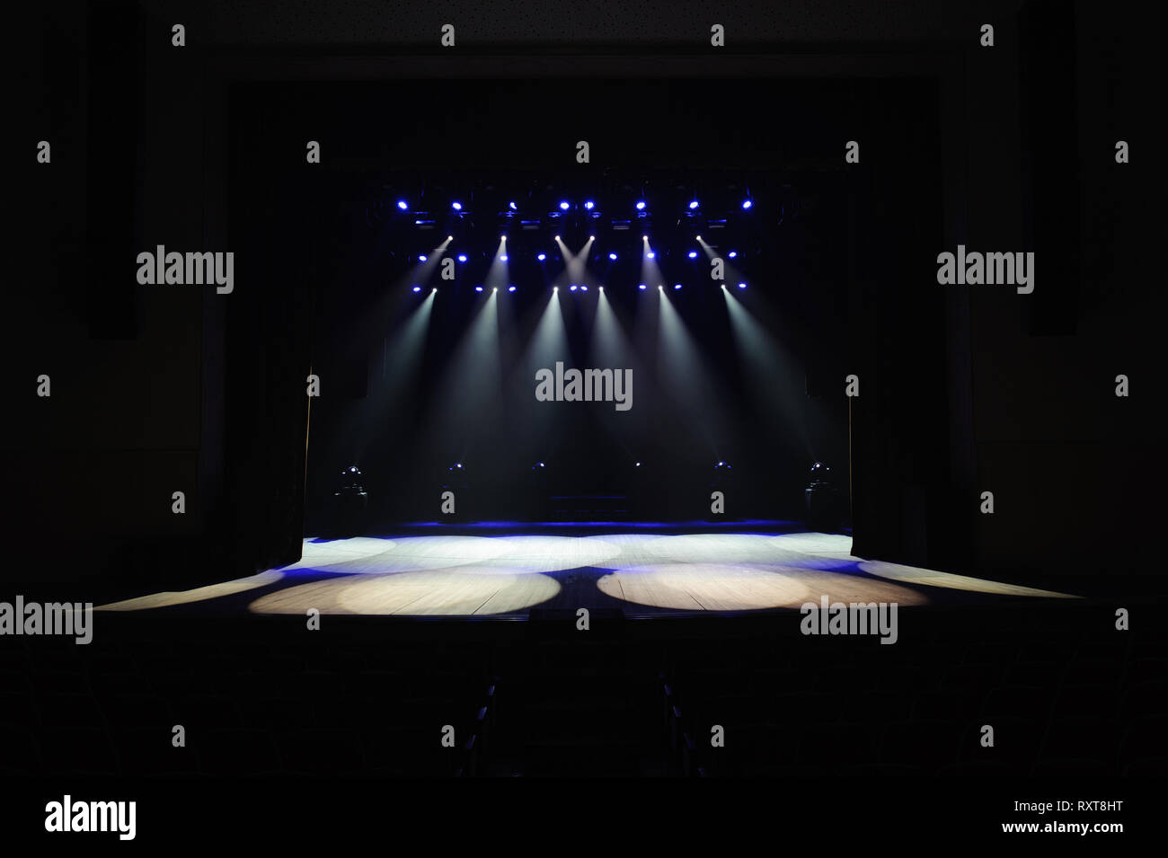 Free stage with lights, lighting devices. Night show Stock Photo - Alamy