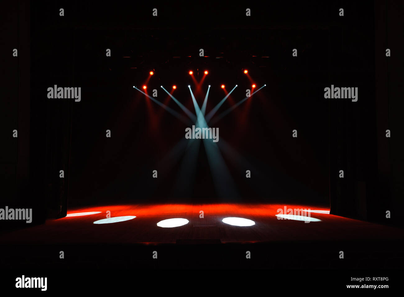 Free stage with lights, lighting devices. Night show Stock Photo - Alamy