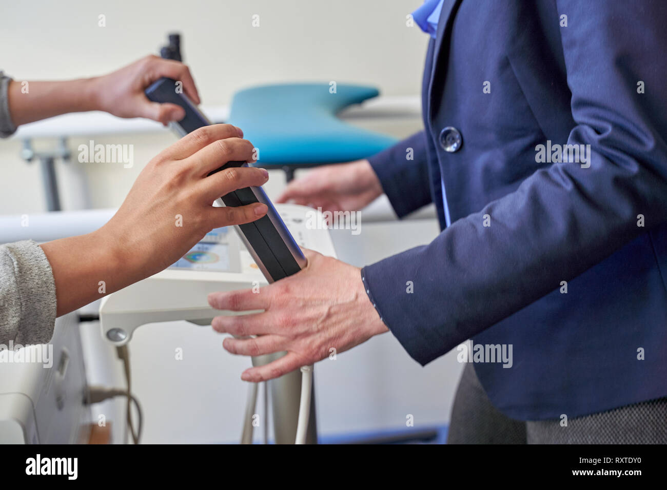 Close up of woman Body Composition Analysis by doctor before Fitness ...